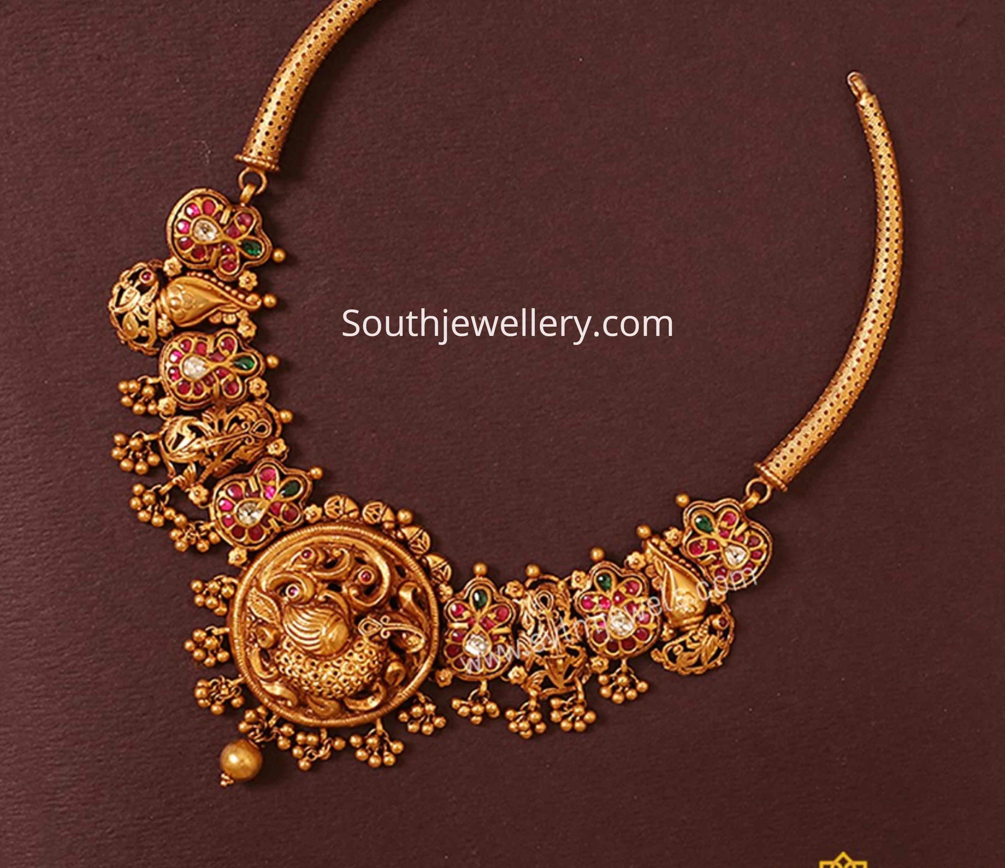 Antique gold necklace with peacock pendant - Indian Jewellery Designs