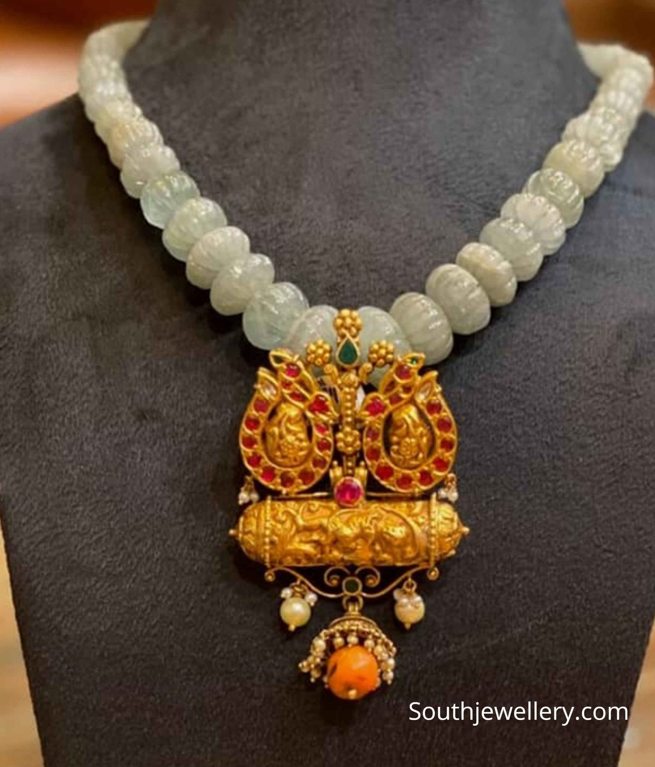 Carved emerald pumpkin beads necklace with gold pendant