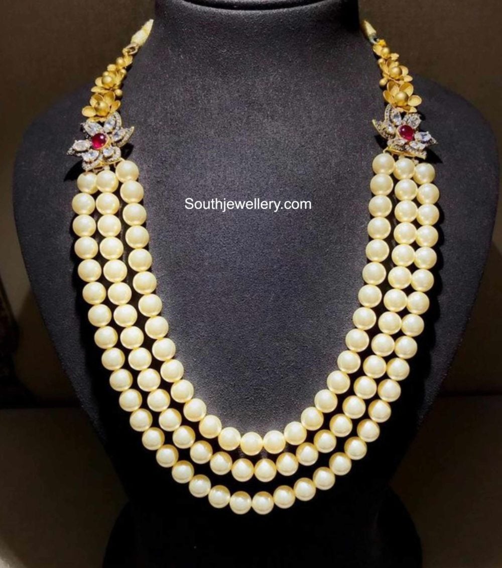 South sea pearl mala with floral side brooches - Indian Jewellery Designs