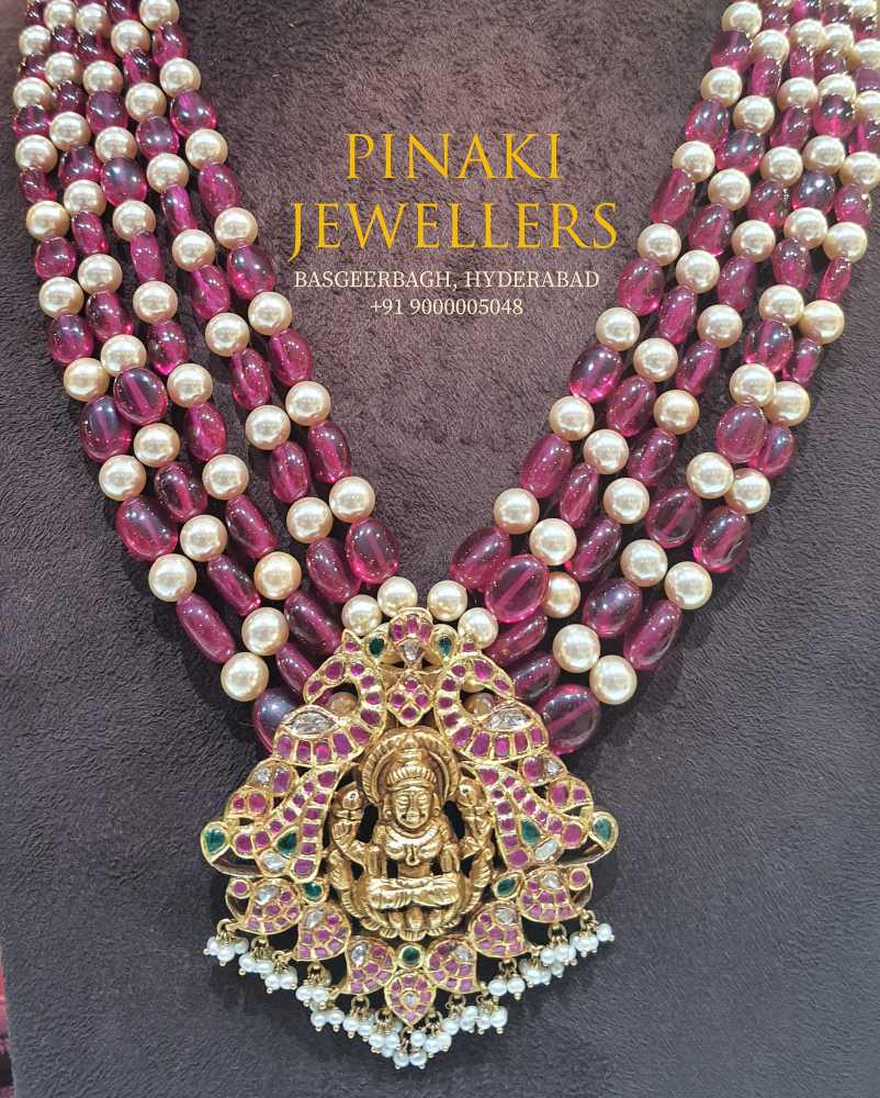 Ruby beads and south sea pearl necklace with Lakshmi pendant