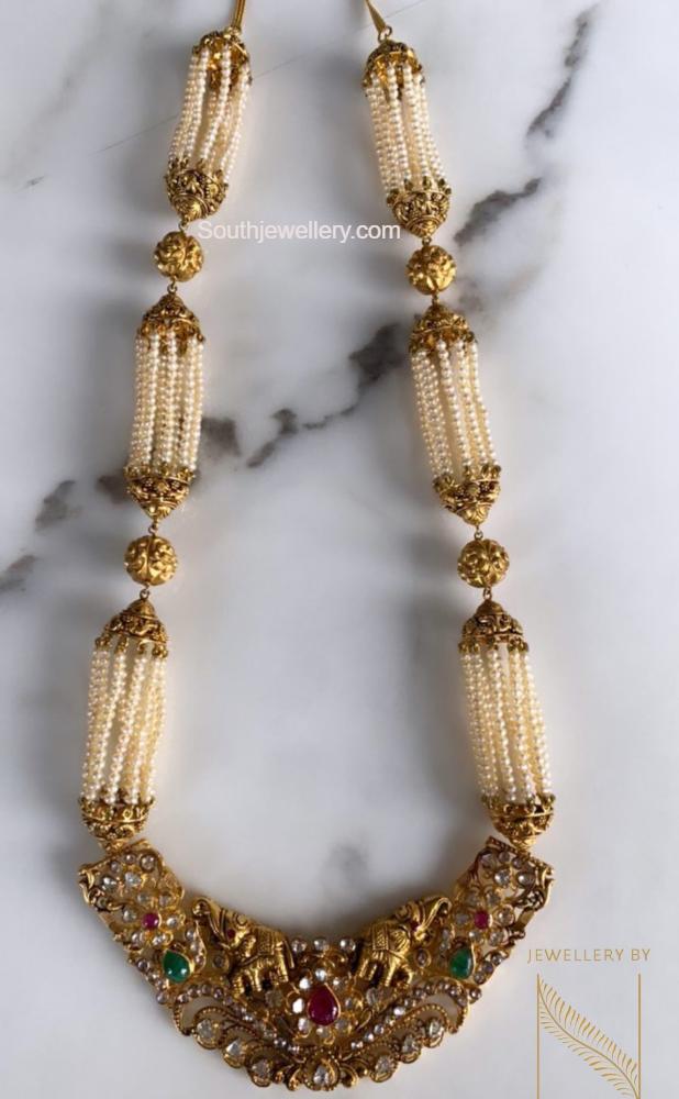 Pearl haram with uncut diamond elephant pendant