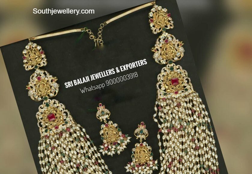 Multi strand south sea pearl mala and ruby jhumkas - Indian Jewellery ...
